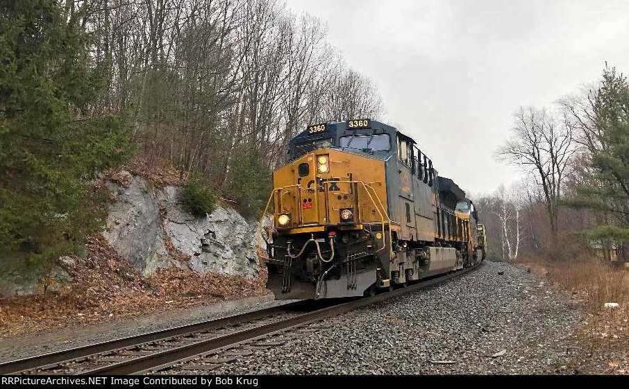 CSX 3360 leads a manifest freight eastbound / up-grade at Canaan Center, NY